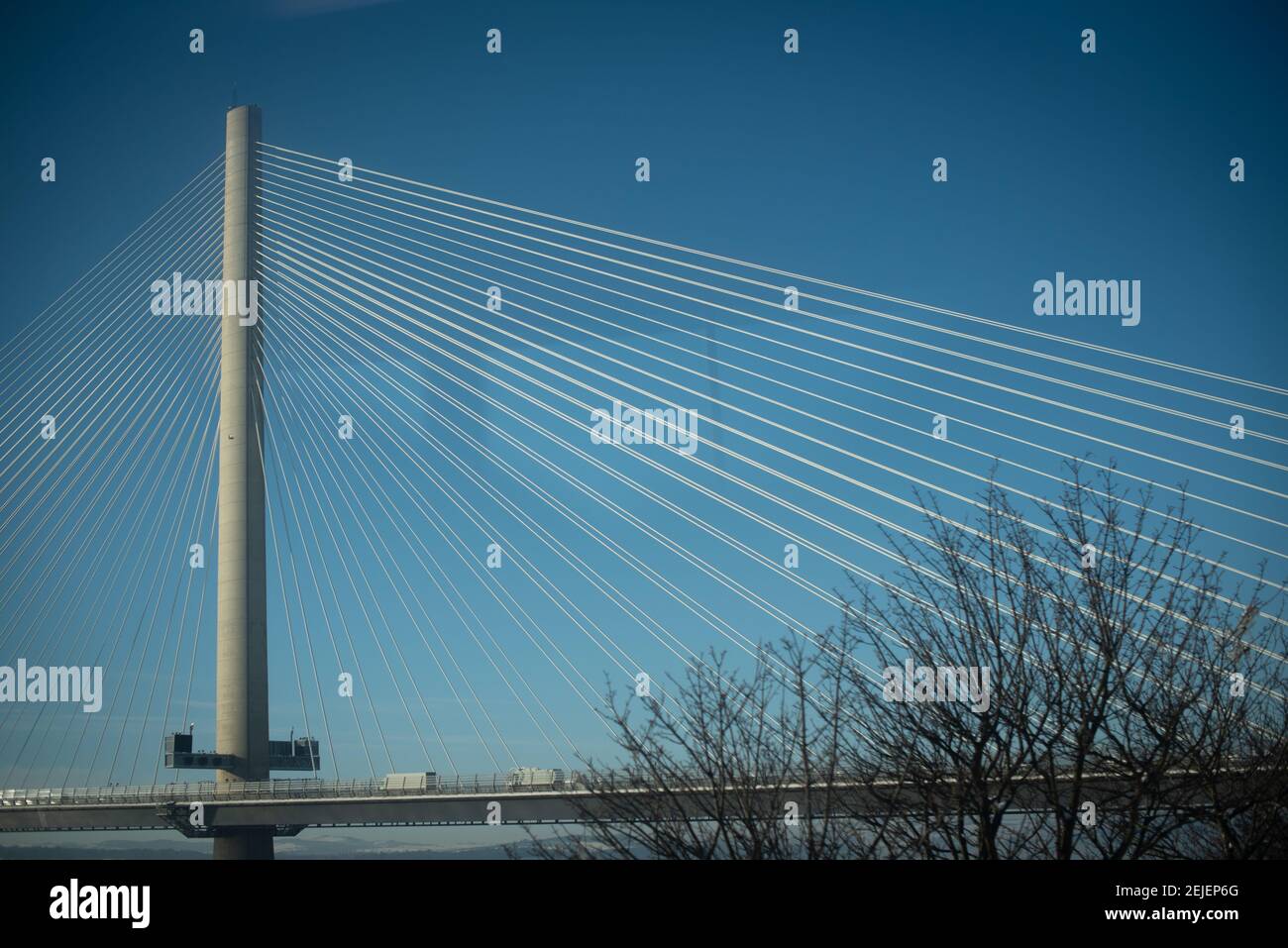 Detail of the Queensferry Crossing Edinburgh with bright blue sky ...