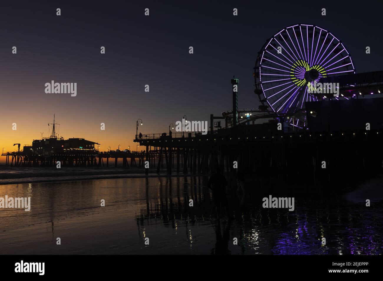 Landmarks and buildings light up in purple and gold, the official Laker ...