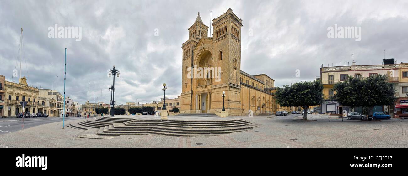 Facade of a church in a town, Birzebbuga Parish Church, Birzebbuga ...