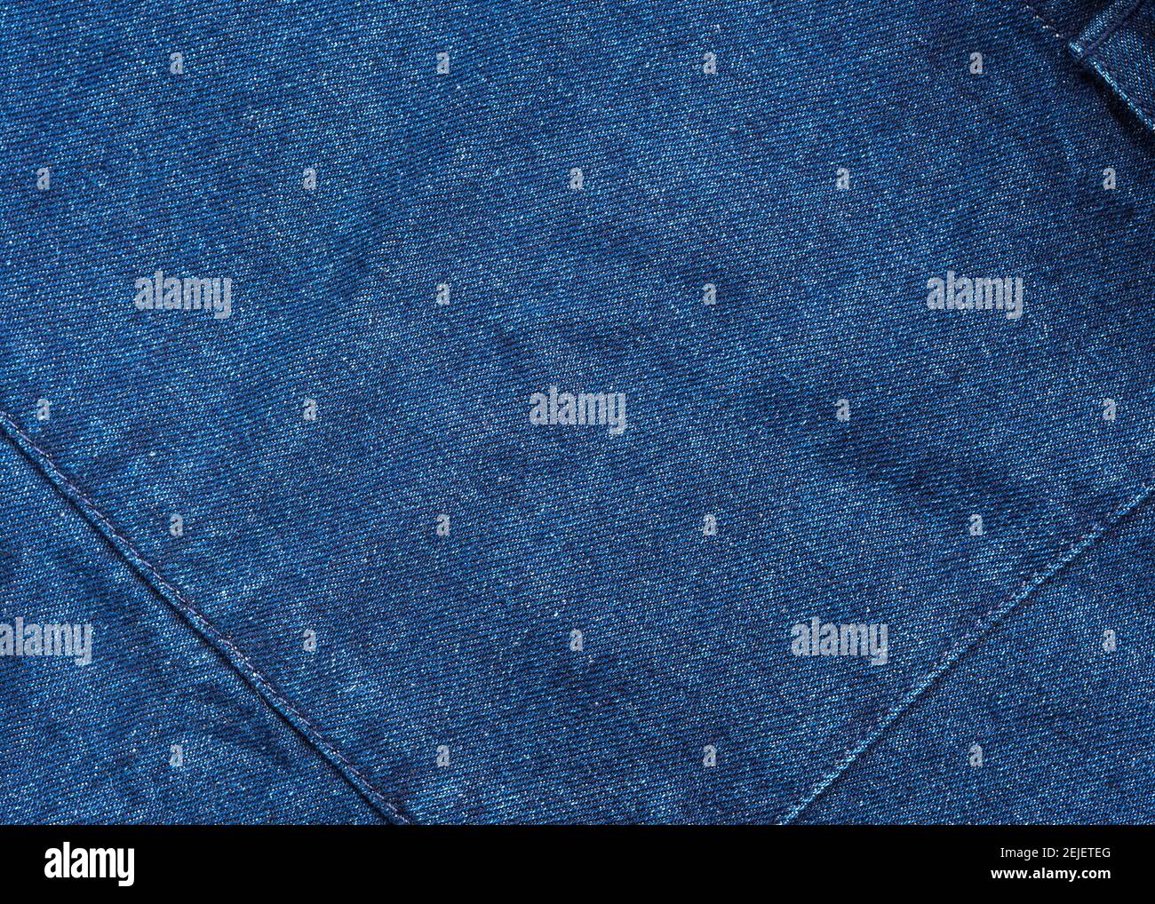 Dark blue jeans denim texture fabric background Stock Photo - Alamy