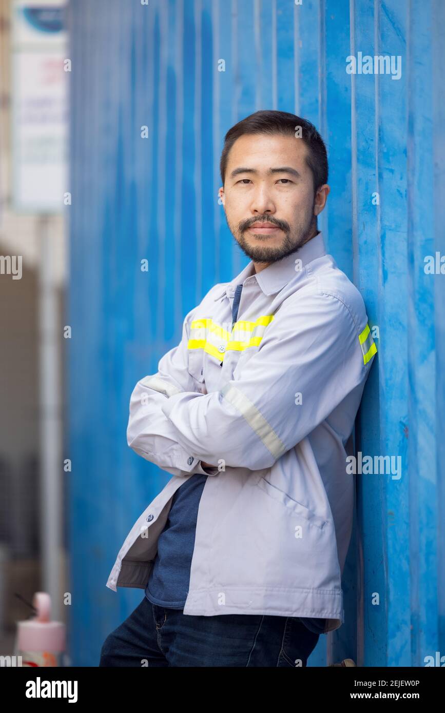 Portrait of worker or technician smile and stand container Stock Photo ...