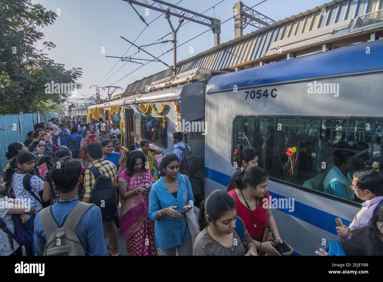 MUMBAI, INDIA - JANUARY 30: People board Central Railway's first air-conditioned EMU local train ...