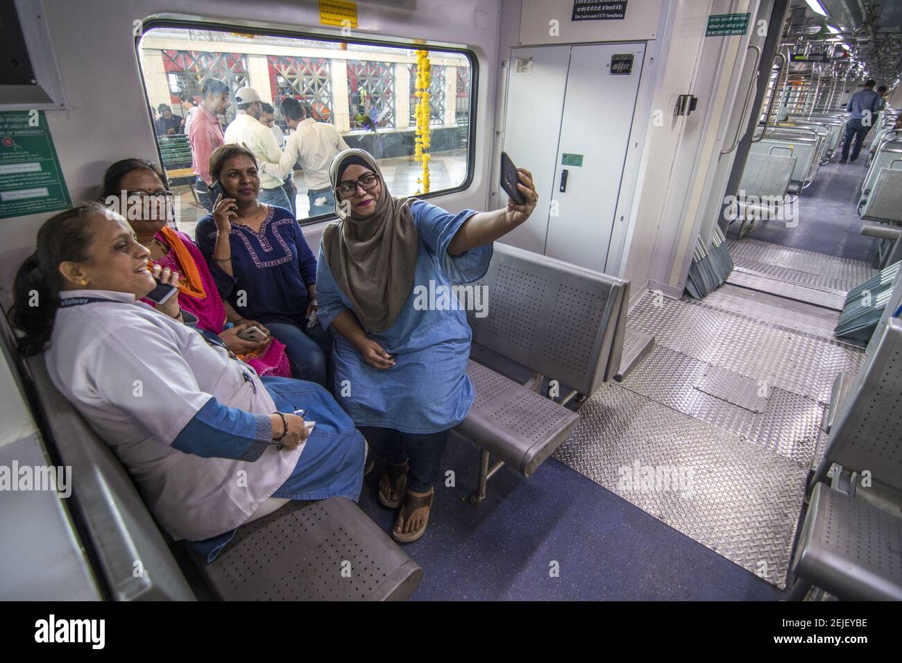MUMBAI, INDIA - JANUARY 30: People travel in Central Railway's first air-conditioned EMU local ...