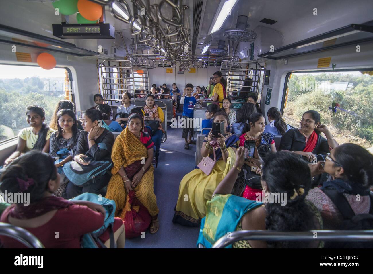 MUMBAI, INDIA - JANUARY 30: People travel in Central Railway's first air-conditioned EMU local ...