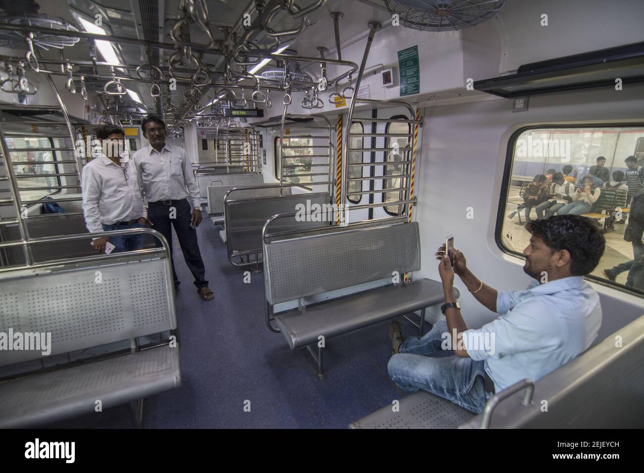 MUMBAI, INDIA - JANUARY 30: People travel in Central Railway's first air-conditioned EMU local ...