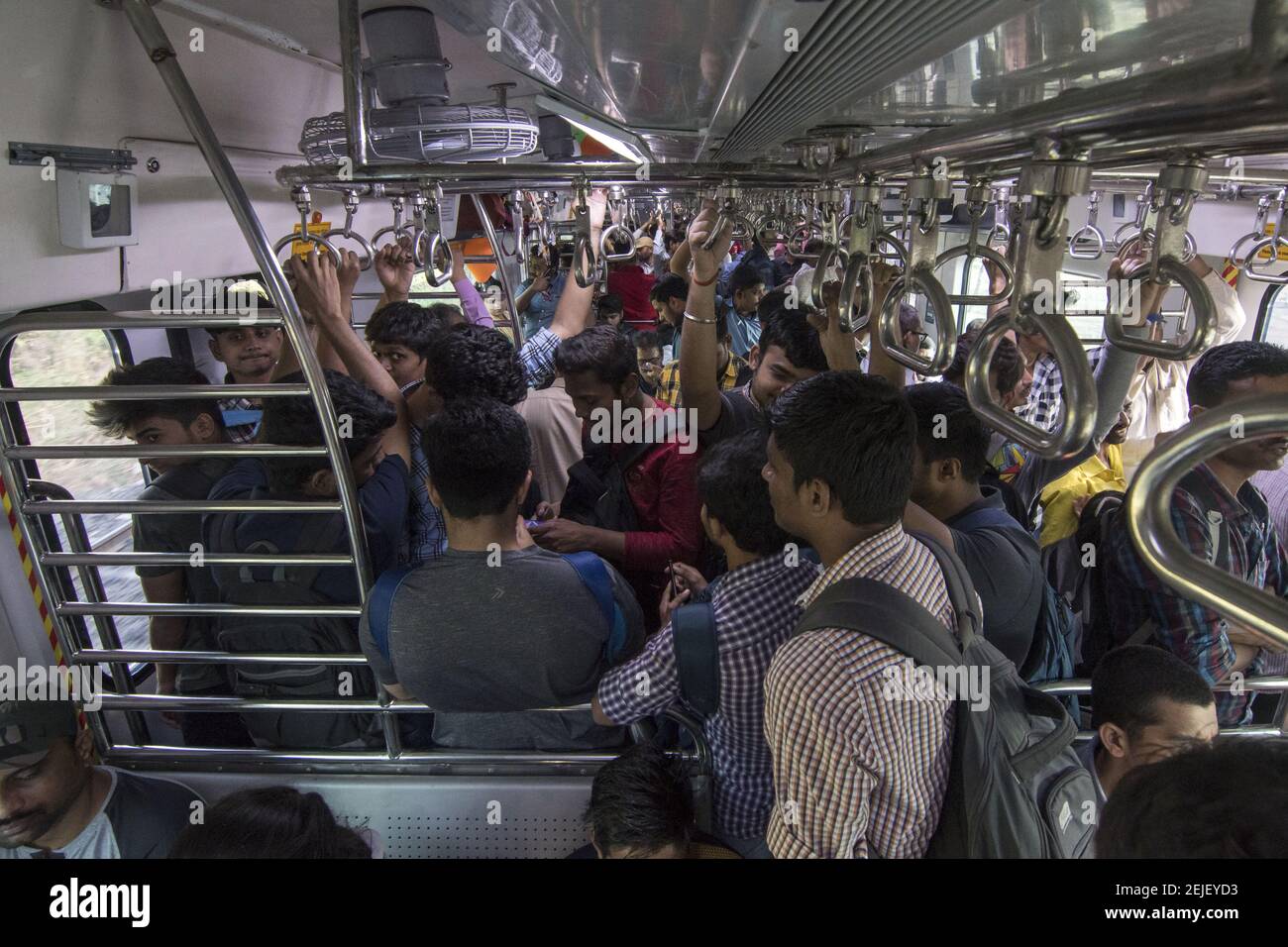 MUMBAI, INDIA - JANUARY 30: People travel in Central Railway's first air-conditioned EMU local ...