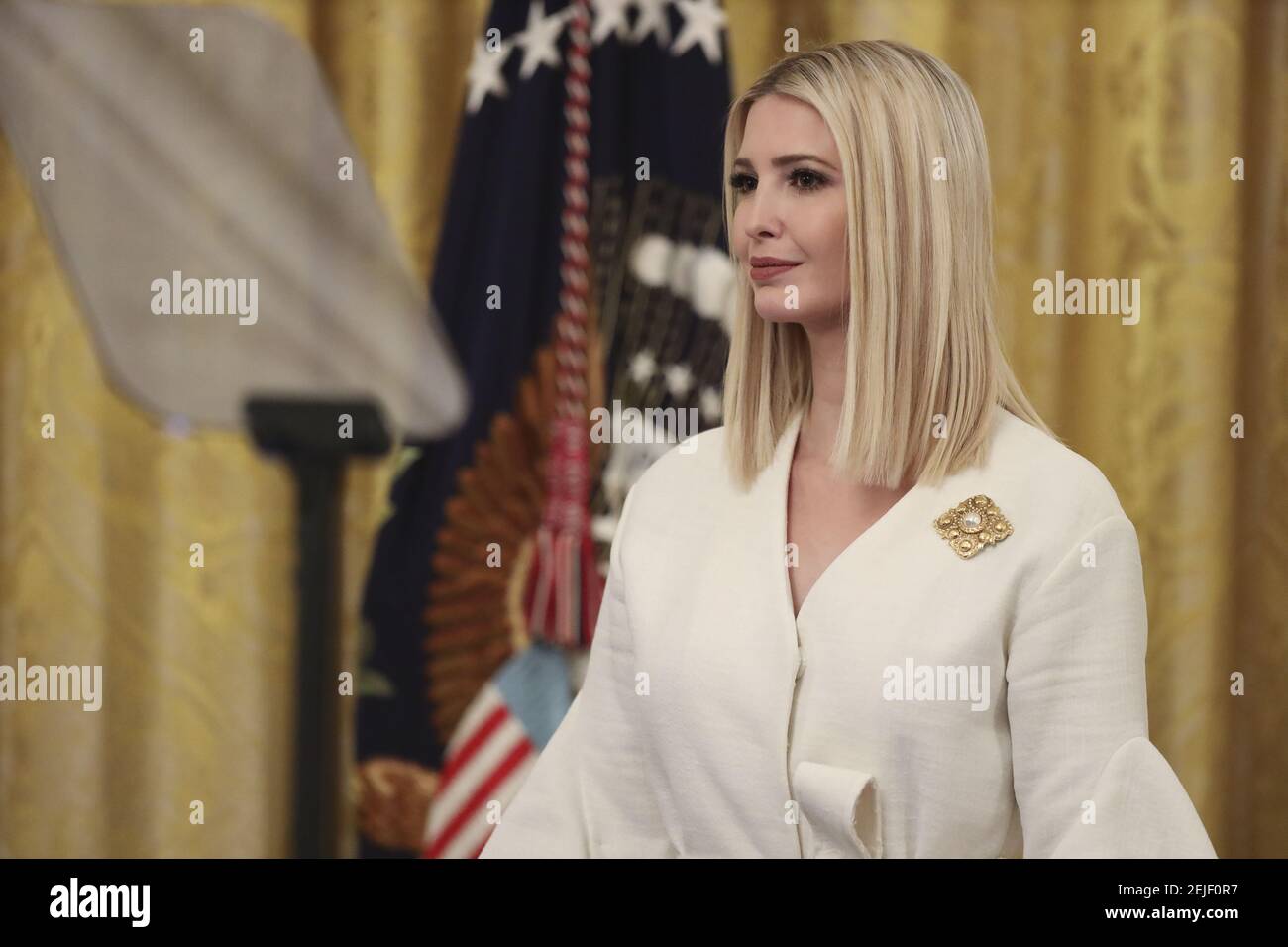 Ivanka Trump listens as President Donald Trump speaks during a Summit ...