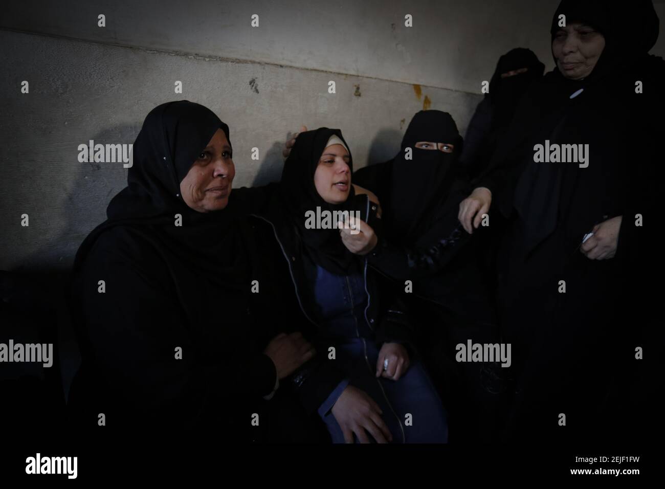 Mother to the deceased mourning during the funeral. Palestinian boy ...