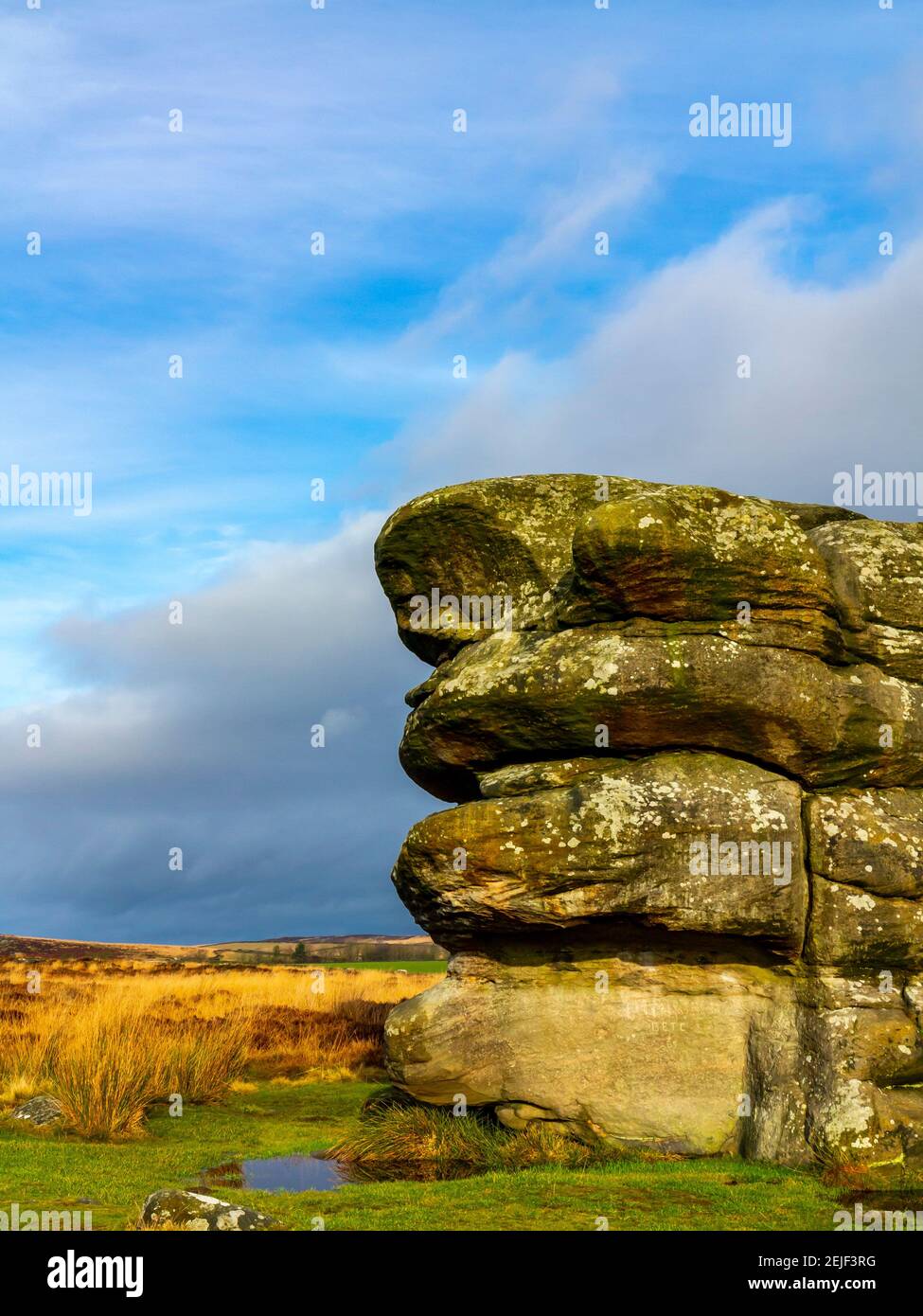 Winter view of the Eagle Stone rock formation near Baslow in the Peak ...