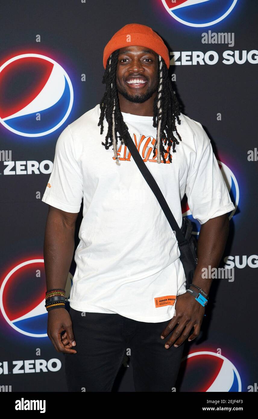 MIAMI, FLORIDA - JANUARY 31: Melvin Gordon arrives during the Pepsi ...