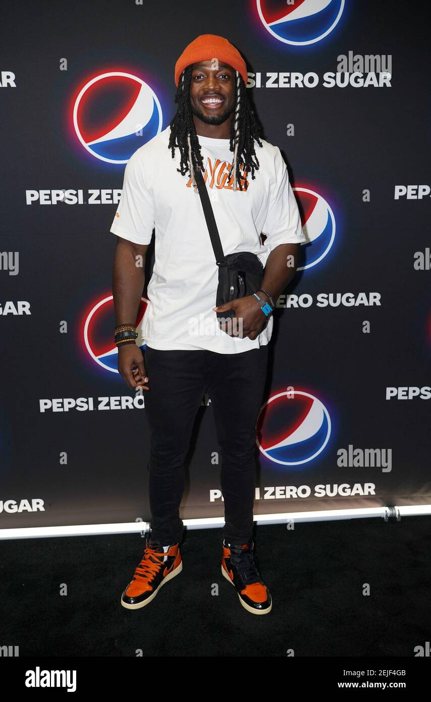 MIAMI, FLORIDA - JANUARY 31: Melvin Gordon arrives during the Pepsi ...