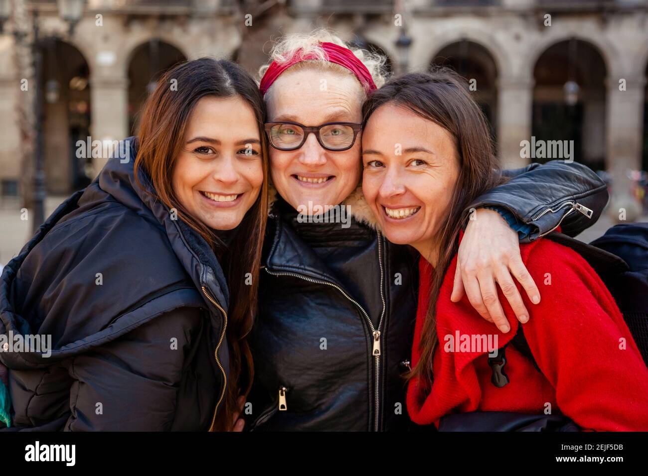 Authentic mixed generations women have fun together outdoor, talking ...