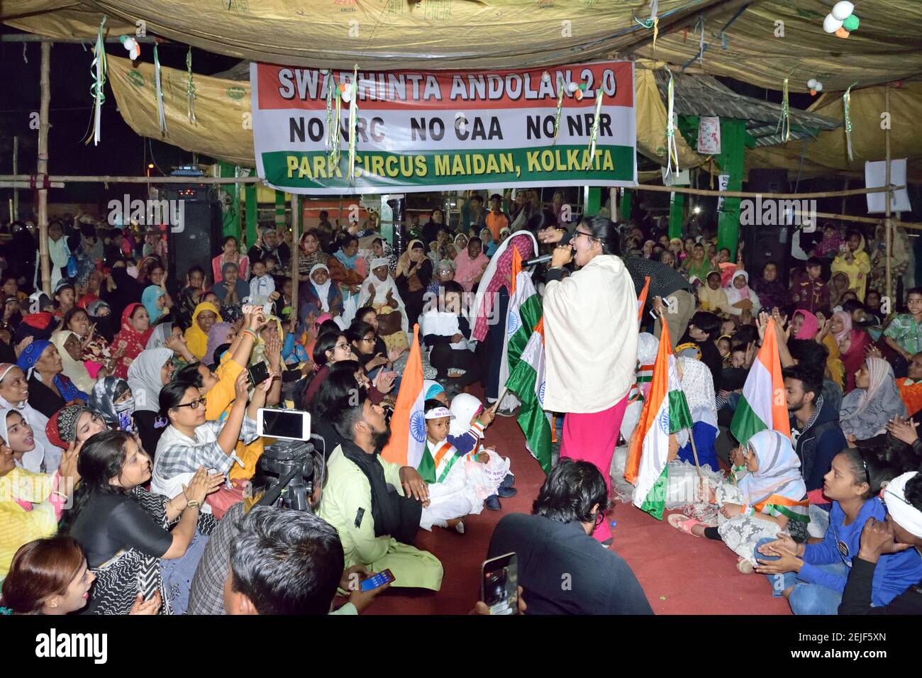 Women chant slogans during the protest. A sit-in protest against the ...