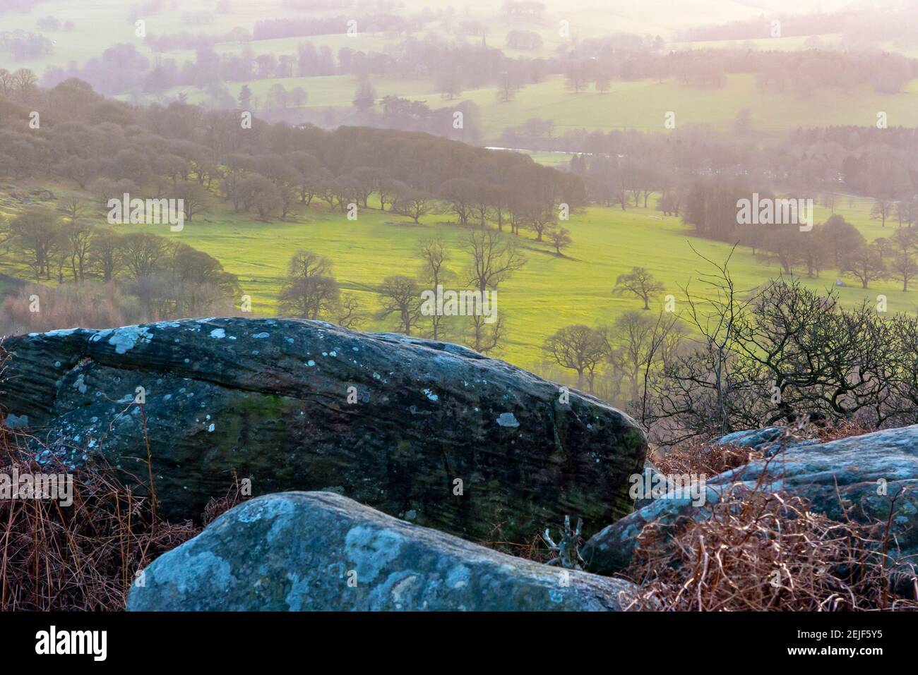 Winter view with rocks and trees at Gardom's Edge near Baslow in the ...