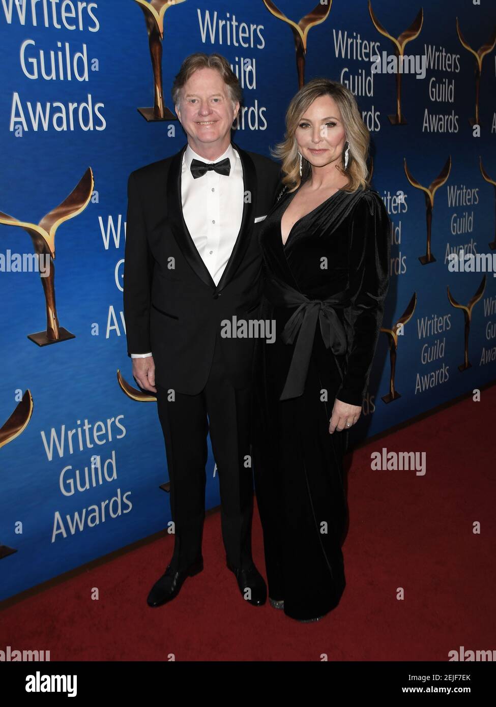 Tom Flynn and Andi Matheny walks the carpet at the 2020 Writers Guild ...