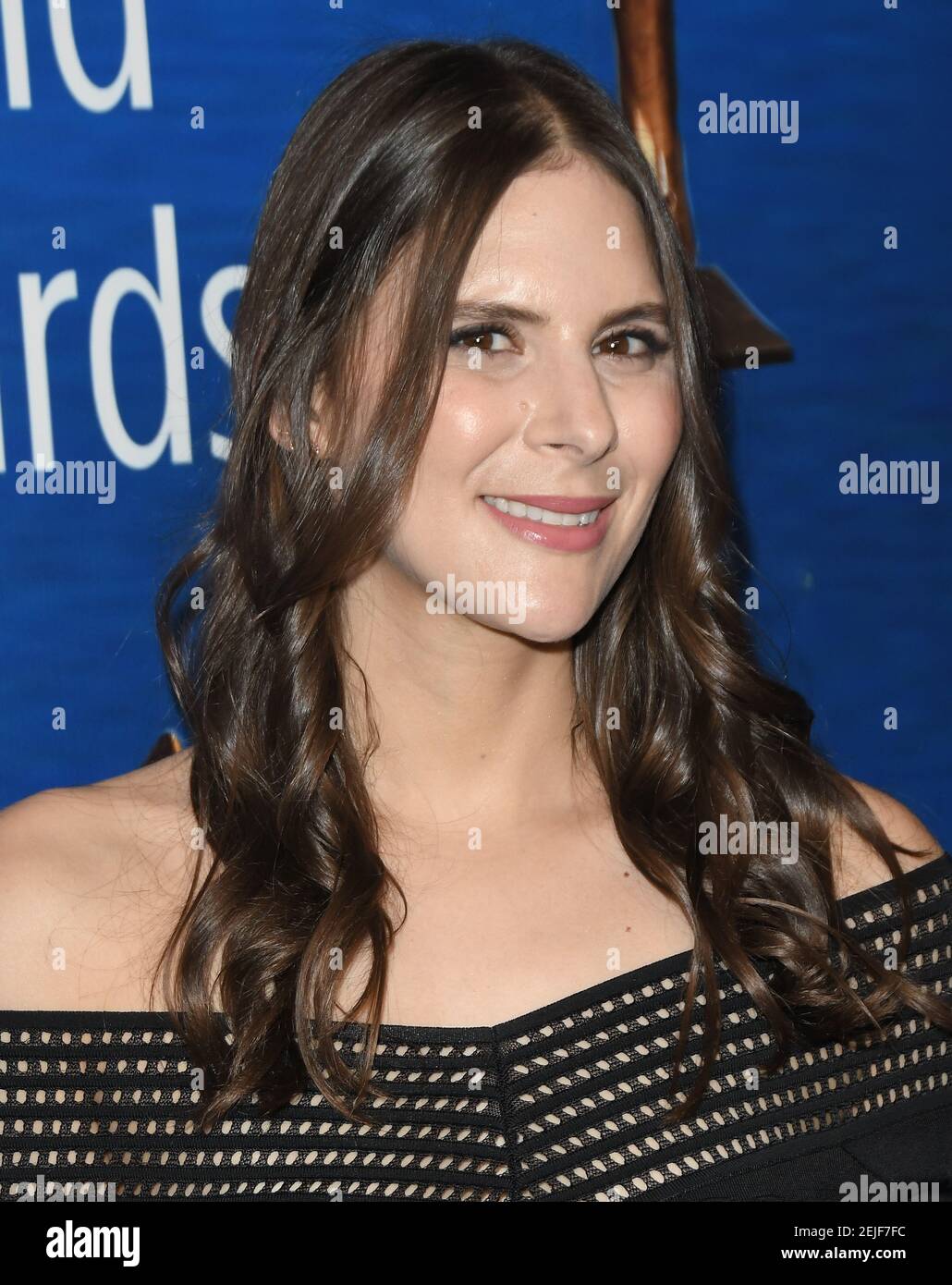 Romi Barta walks the carpet at the 2020 Writers Guild Awards held at ...