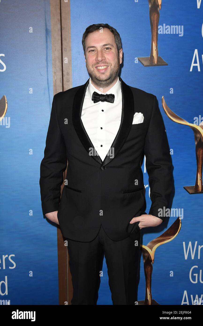 Benjamin Klein walks the carpet at the 2020 Writers Guild Awards held ...