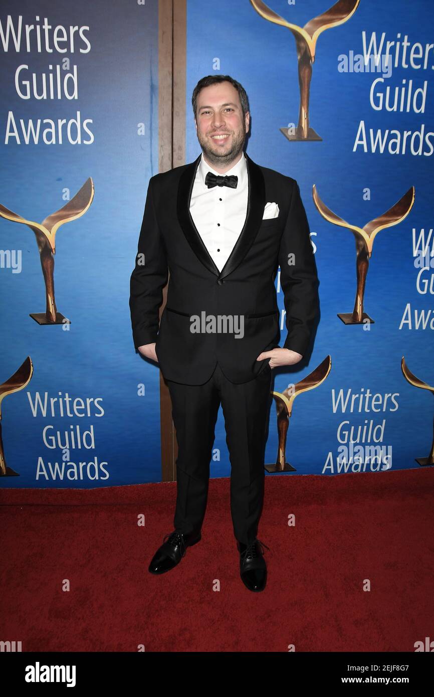 Benjamin Klein walks the carpet at the 2020 Writers Guild Awards held ...