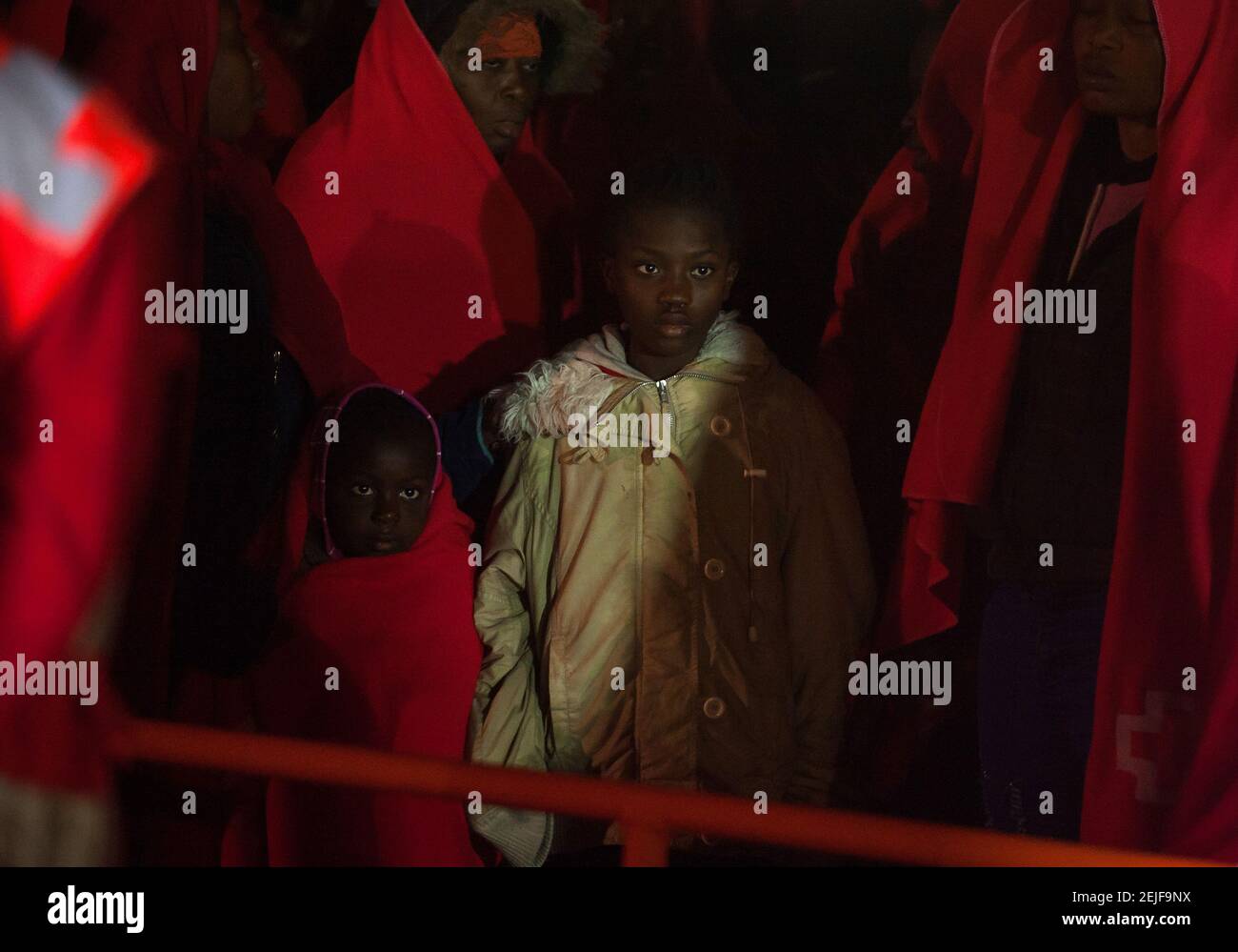 Subsaharan migrant children, who were rescued from a dinghy at the ...