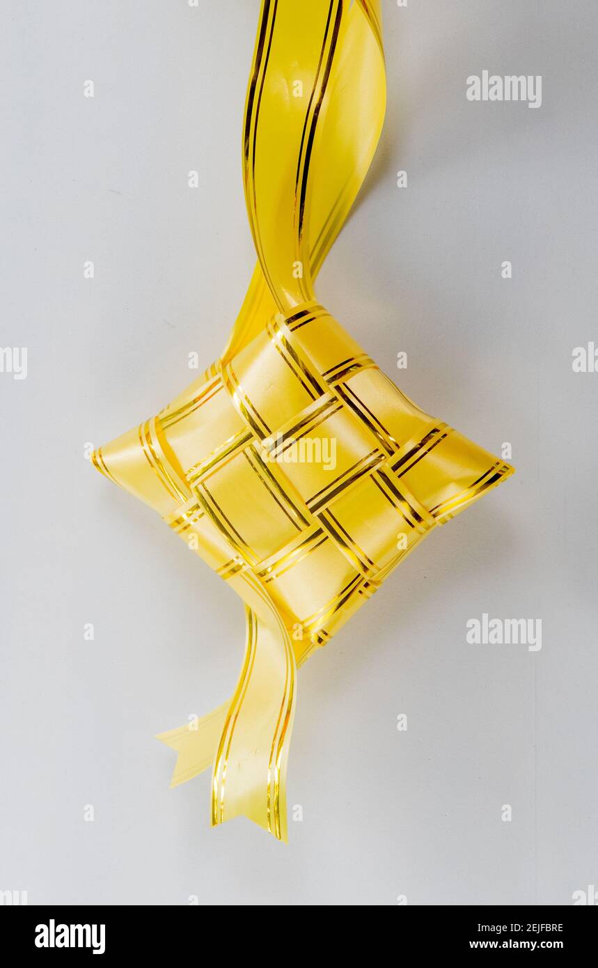 The beutiful gold colors ribbon of ketupat raya Stock Photo - Alamy