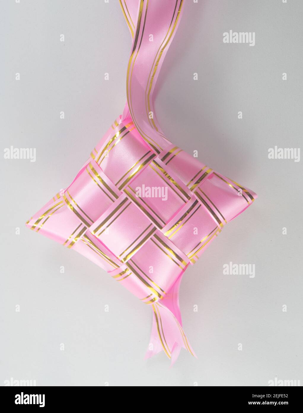 The beutiful pink colors ribbon of ketupat raya Stock Photo - Alamy