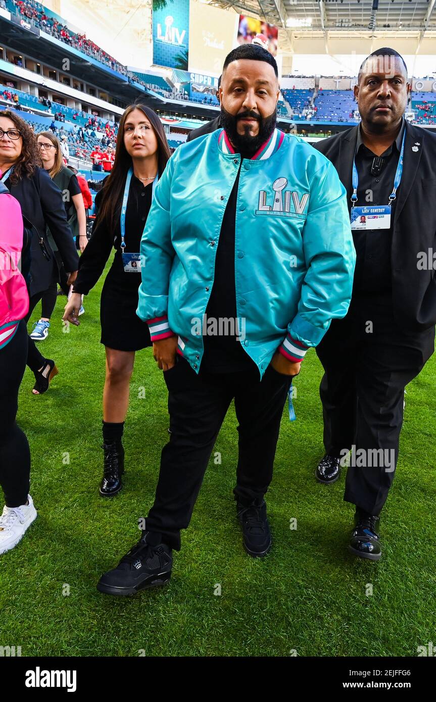 DJ Khaled walks on the field before Super Bowl LIV between the San ...