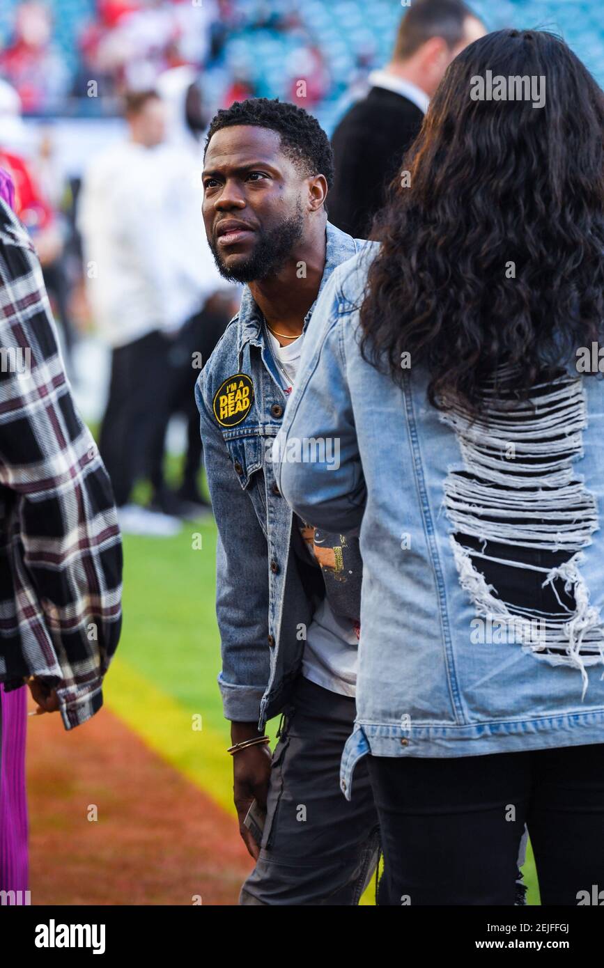 Kevin Hart walks on the field before Super Bowl LIV between the San ...