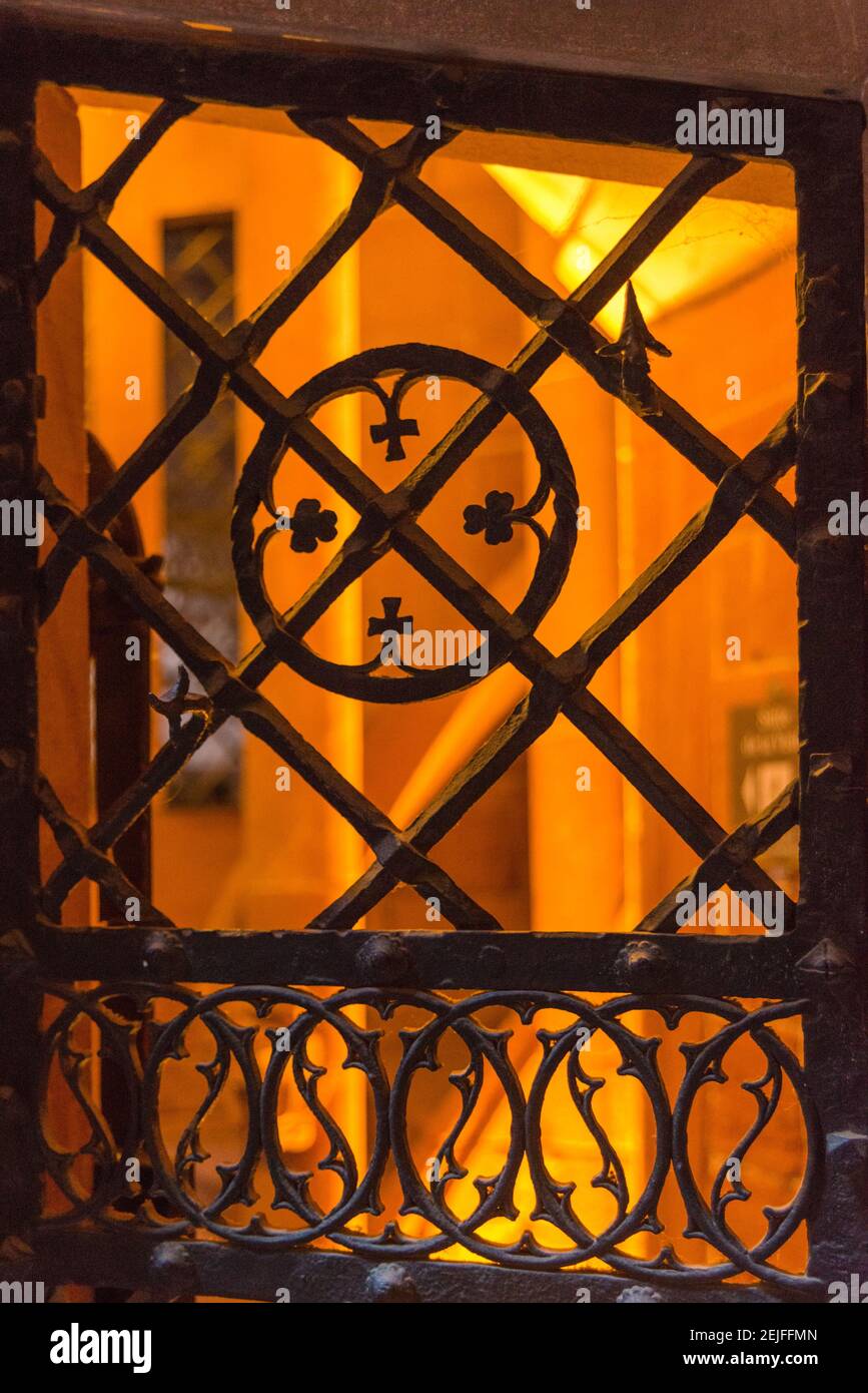 Detail of ironwork of a medieval window inside the Haut-Koenigsbourg ...