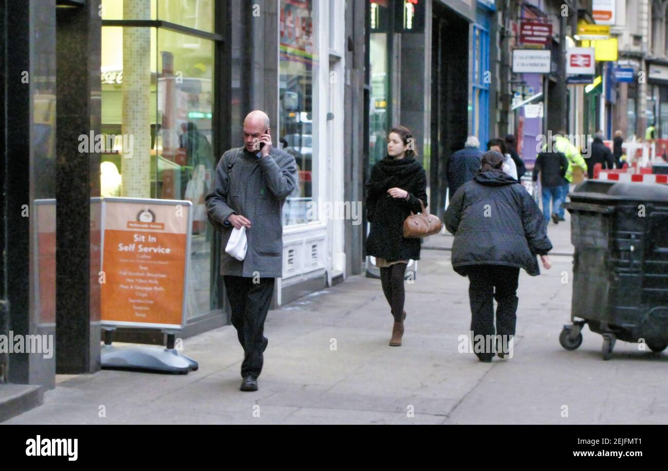 People walking along a busy street in Glasgow, Scotland Stock Photo - Alamy