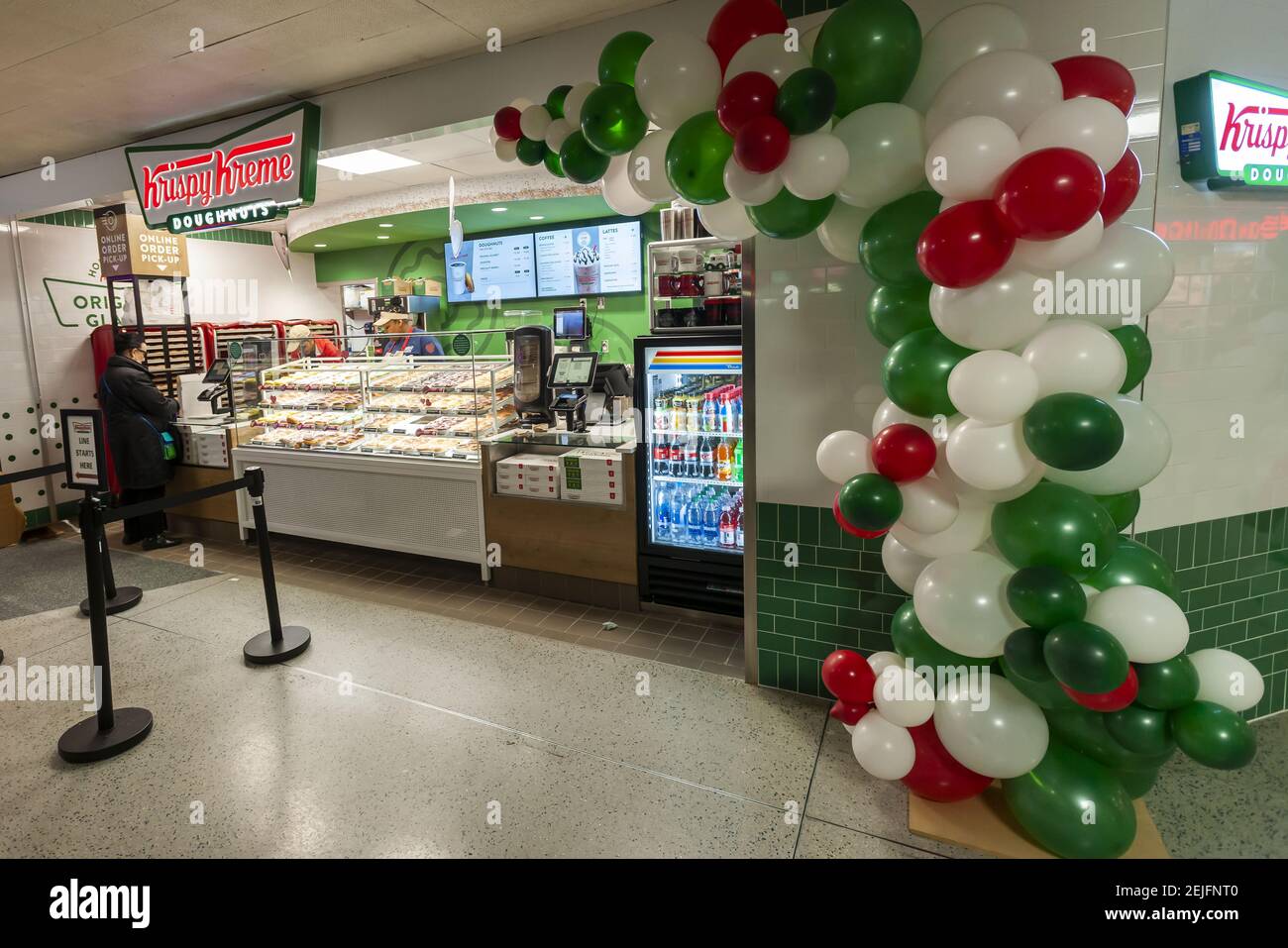 Customers clamor around the newly re-opened Krispy Kreme in Penn ...