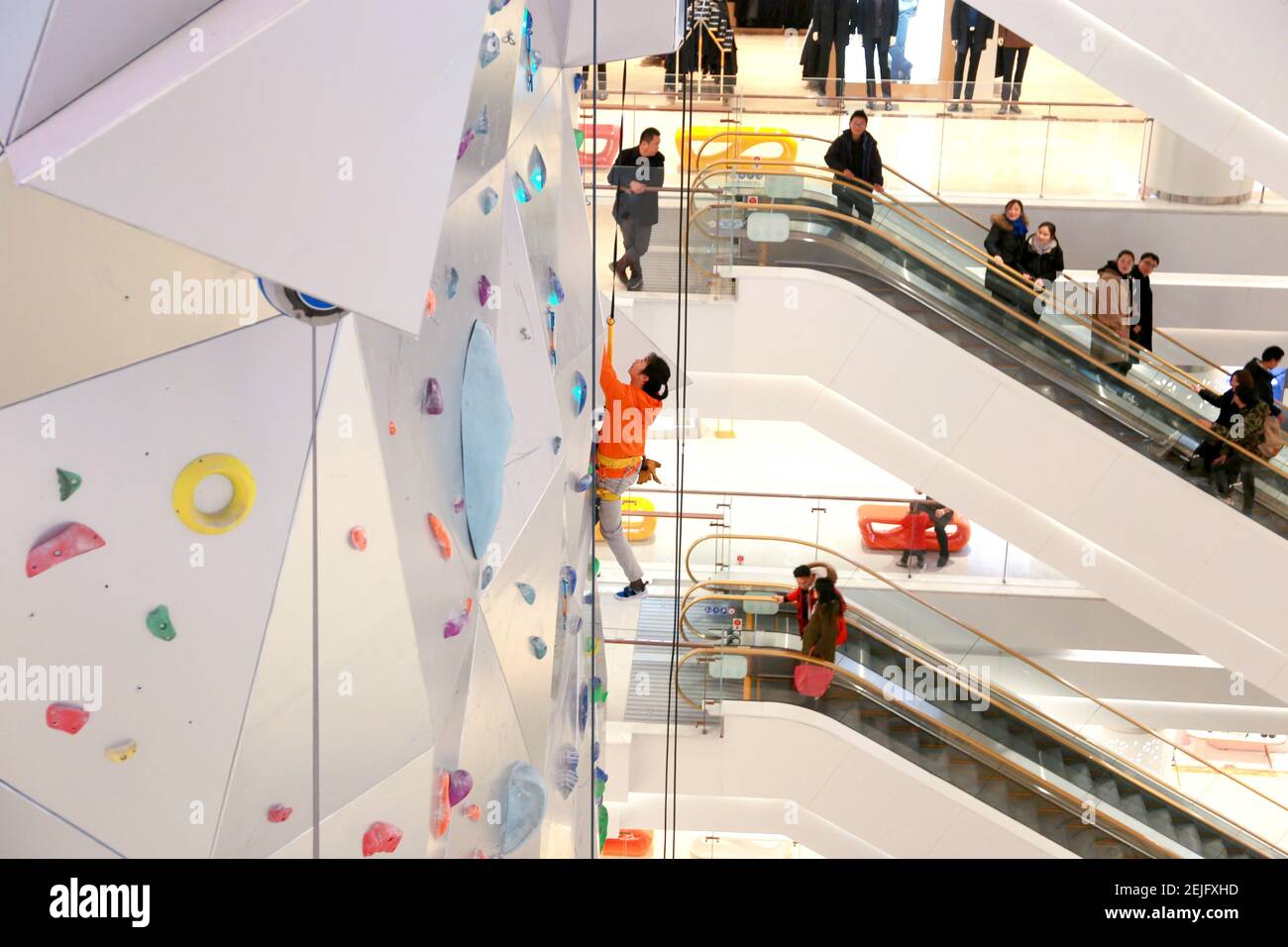 Climbers experience the worldwide highest indoor rock-climbing facility ...