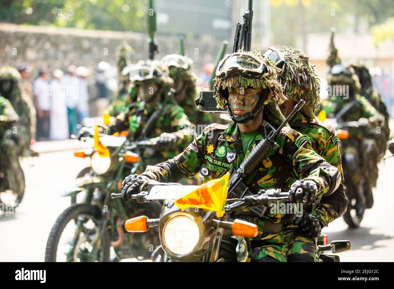 A Sri Lankan military personnel march during Sri Lanka's 72th ...