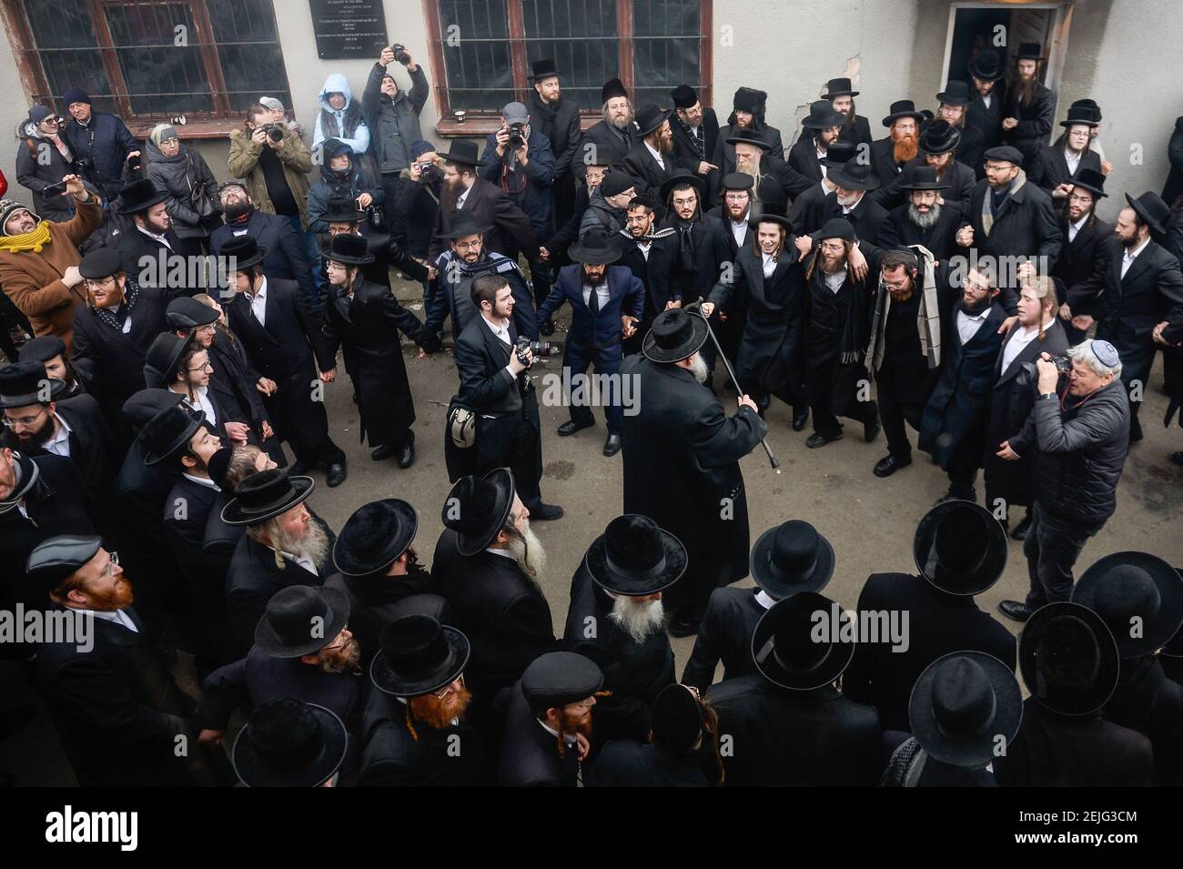 Hasidic Jews dance together during the celebration. The 206th feast of ...