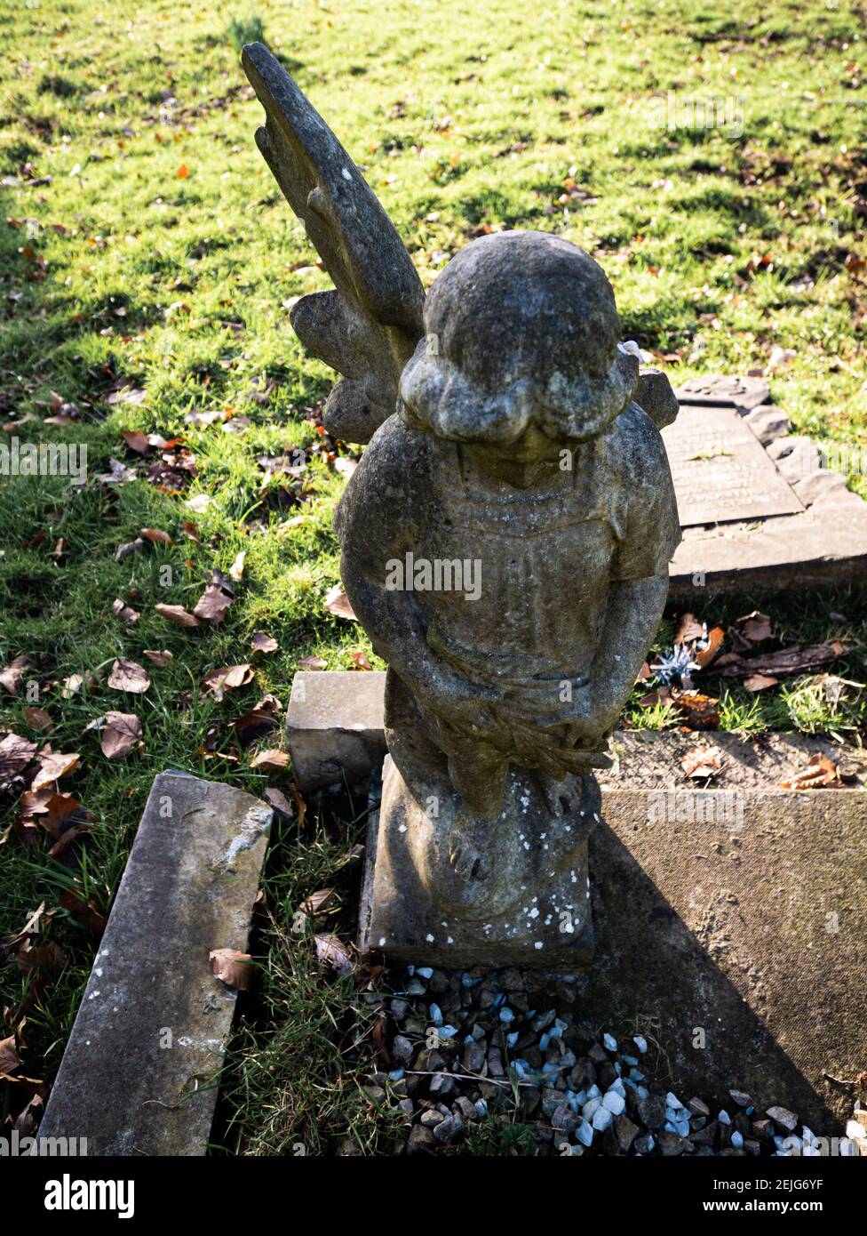 Vandalised angel statue Stock Photo - Alamy