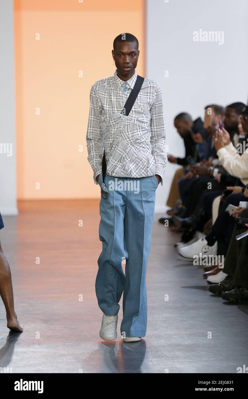 Model walks on the runway at the Kenneth Nicholson fashion show during ...