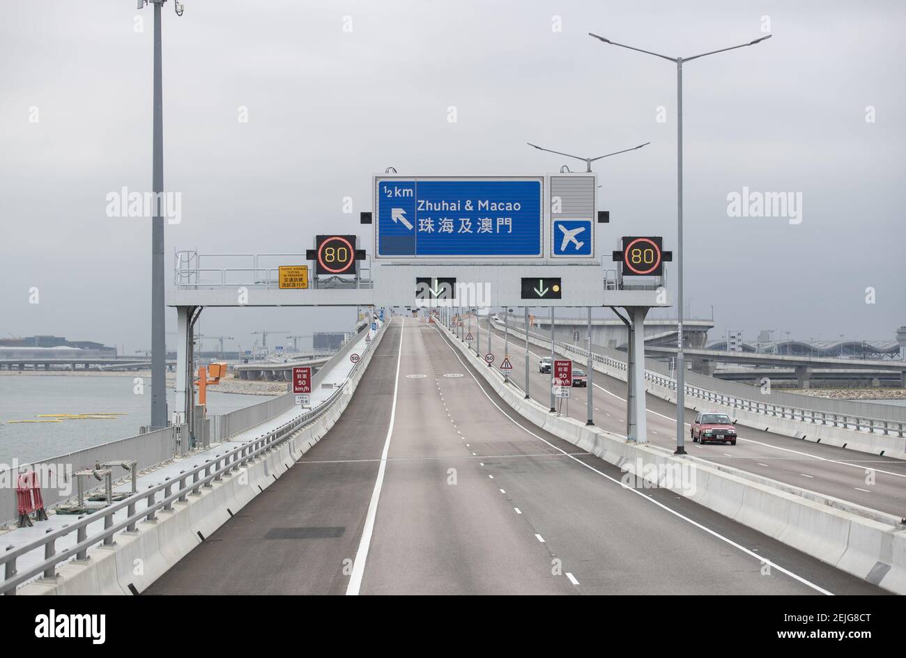A road sign of Zhuhai, Macao direction seen on the way to Hong Kong ...