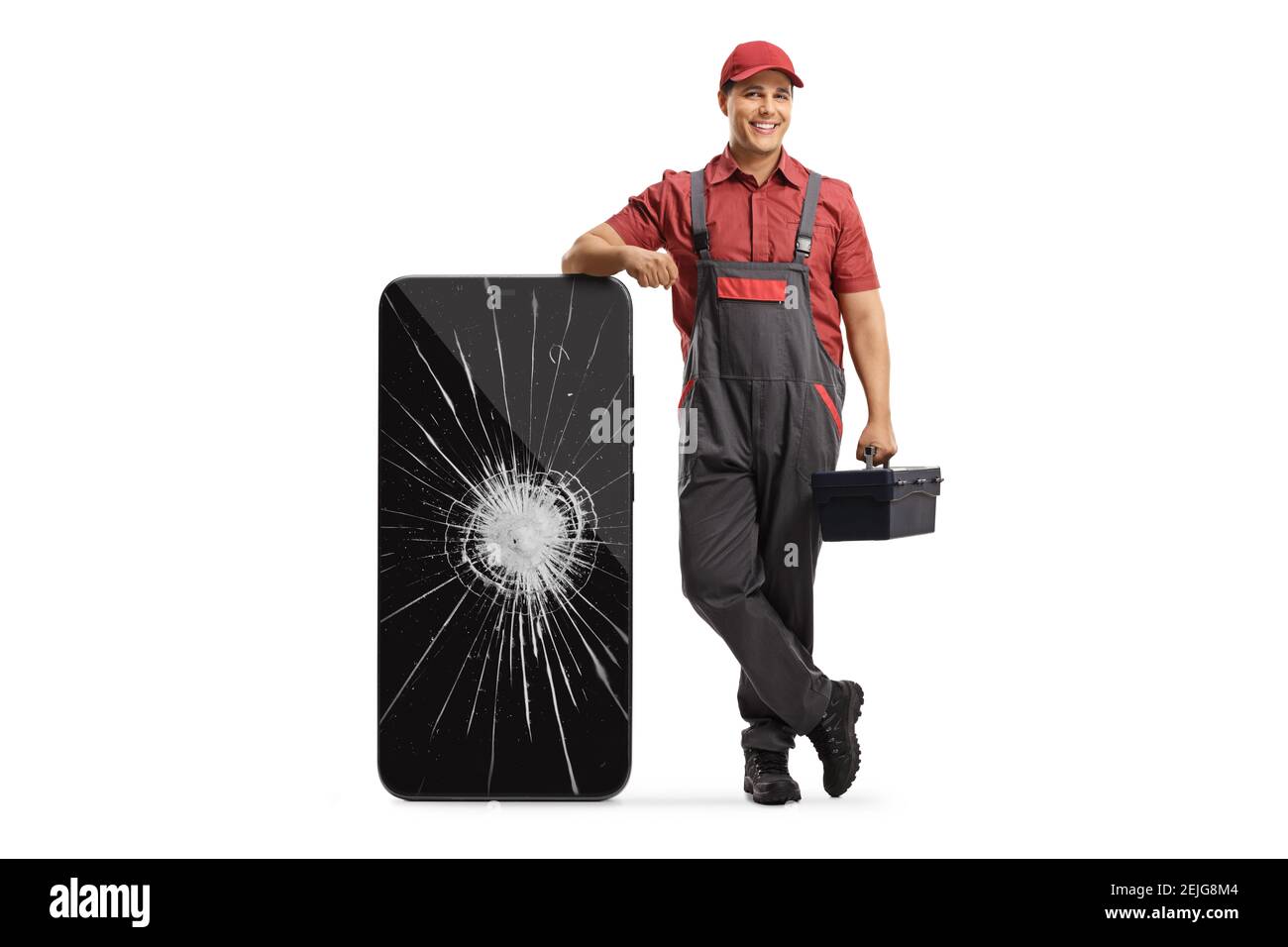 Mobile phone repair technician leaning on a smartphone with a broken ...