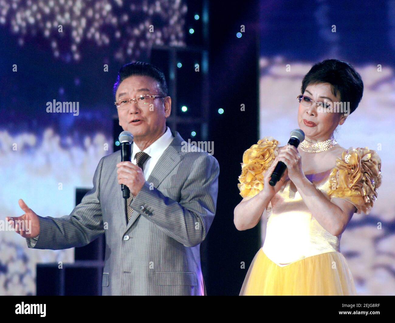 Chinese singer Jiang Dawei, left, and Li Guyi attend CCTV New Year ...