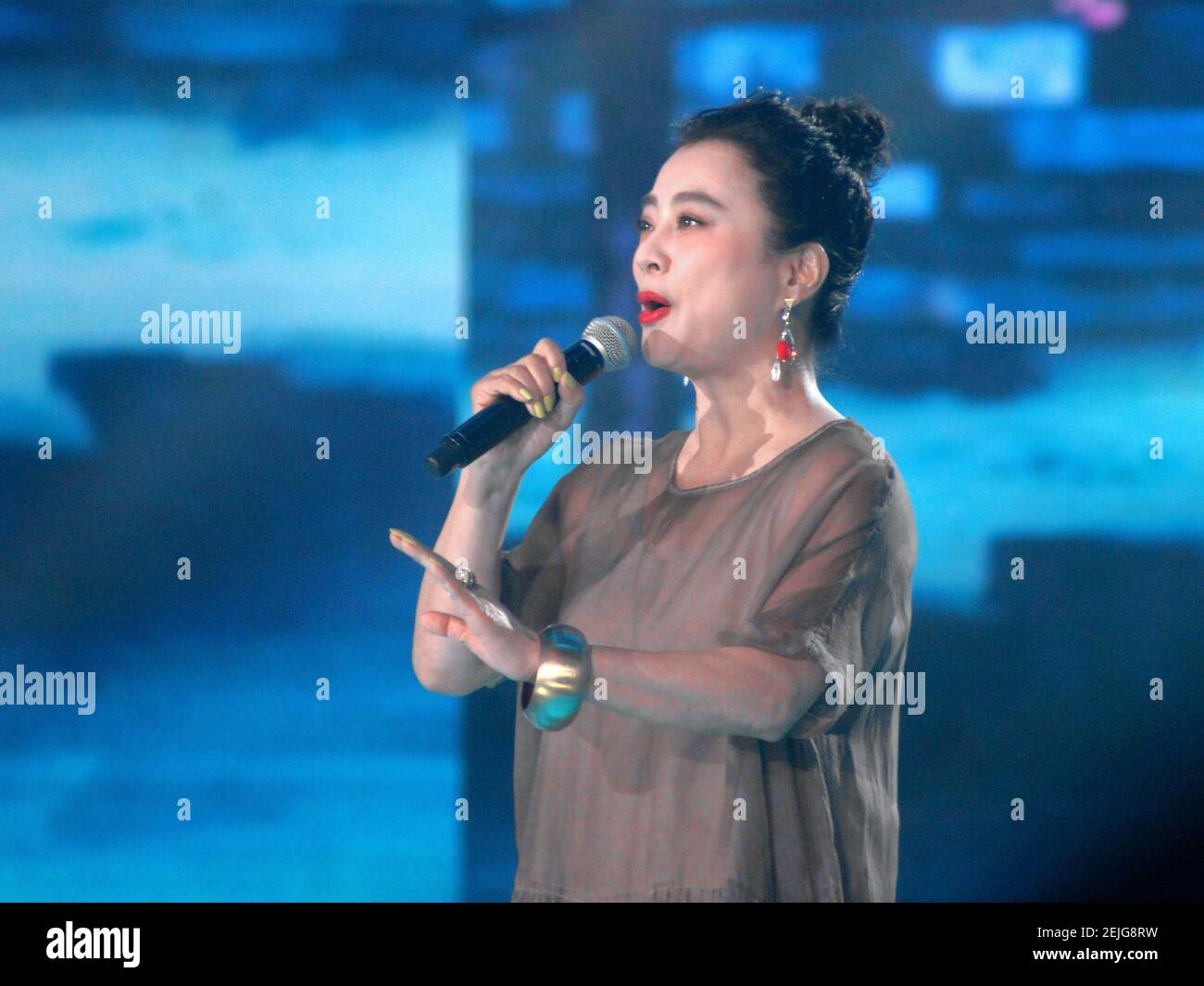 Chinese singer Li Lingyu attends CCTV New Year singing in Beijing ...