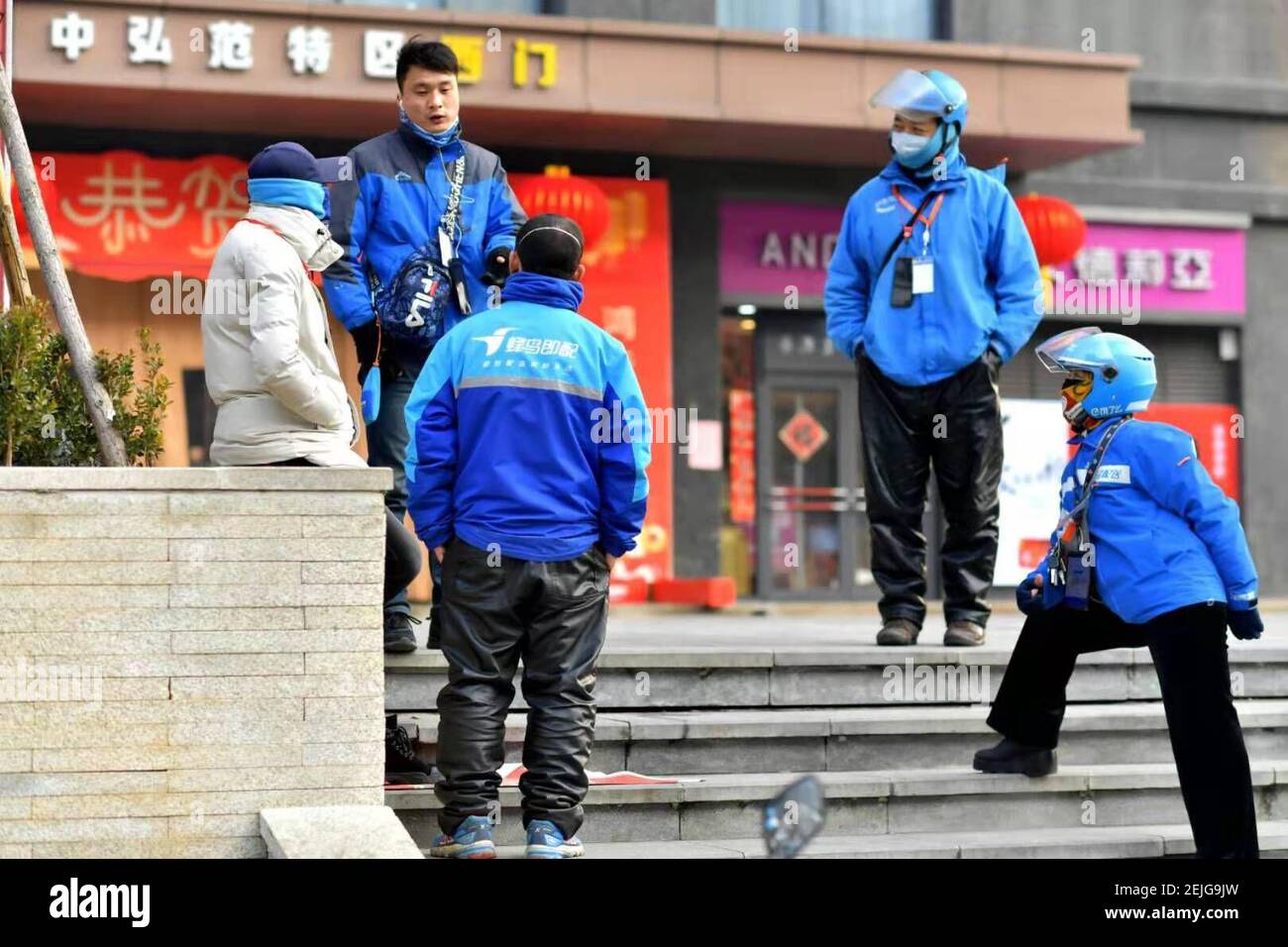 Delivery guys of Ele.me, a Chinese O2O catering and food delivery ...