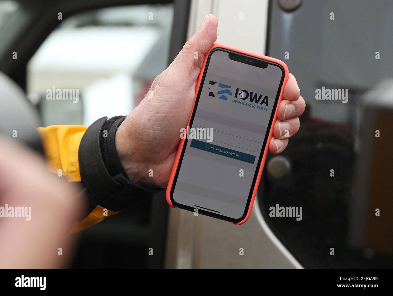 Precinct Chair Carl Voss shows the phone app he used for the Iowa ...