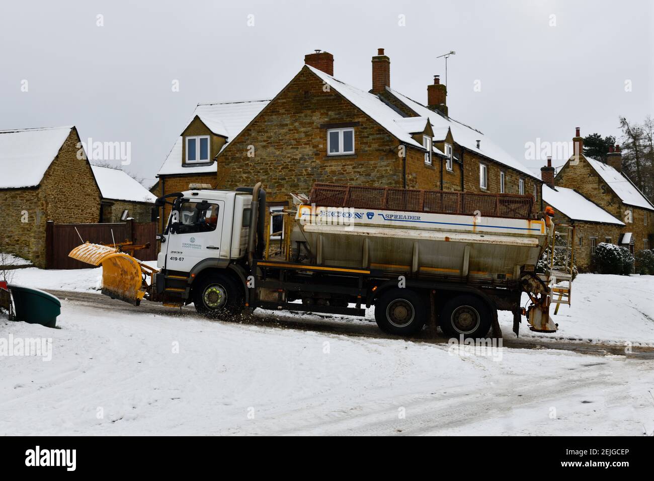 Snow Plough and Gritter in Hook Norton Stock Photo - Alamy
