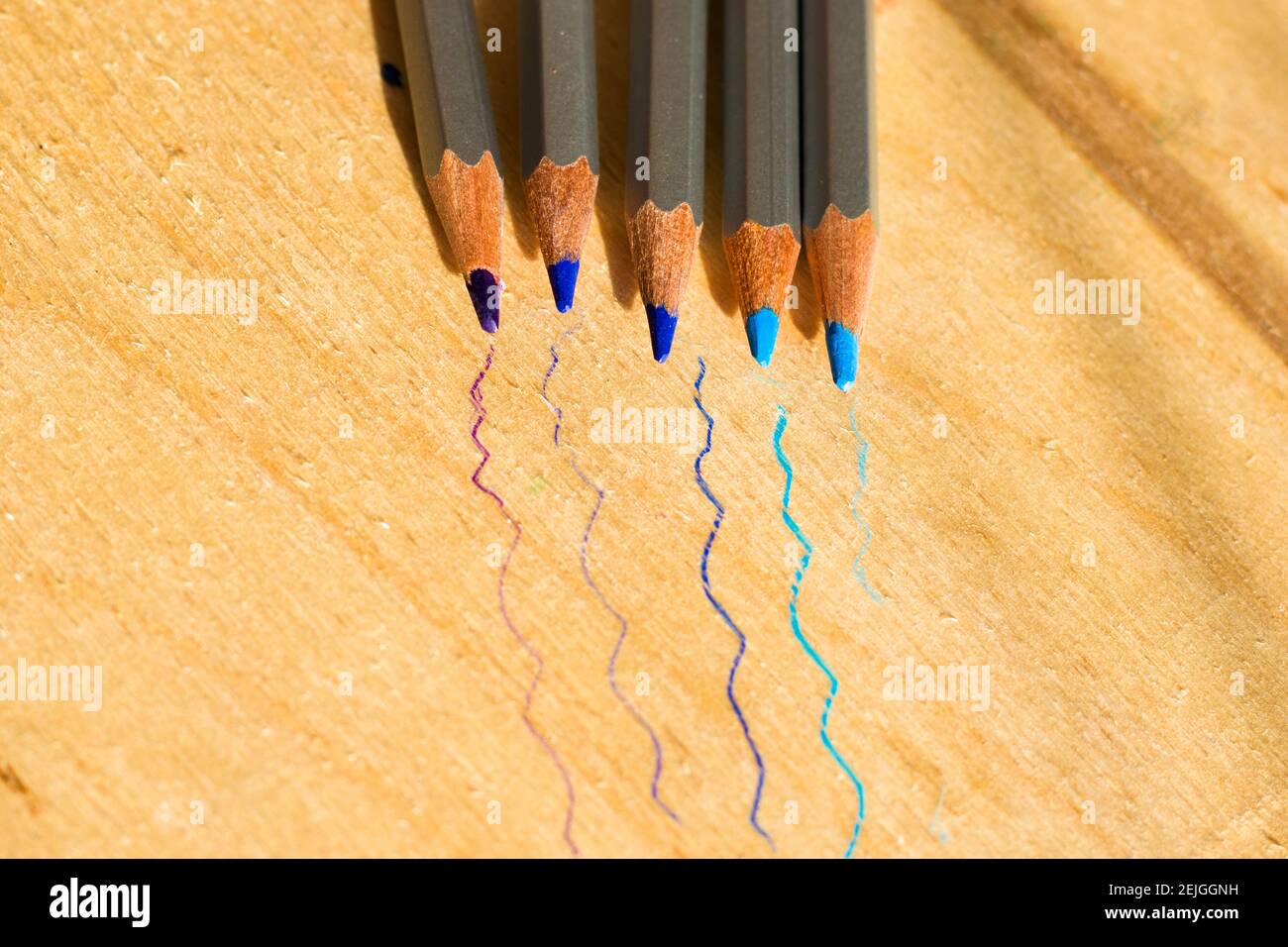 Pencils on the table, gradient of blue pencils Stock Photo - Alamy
