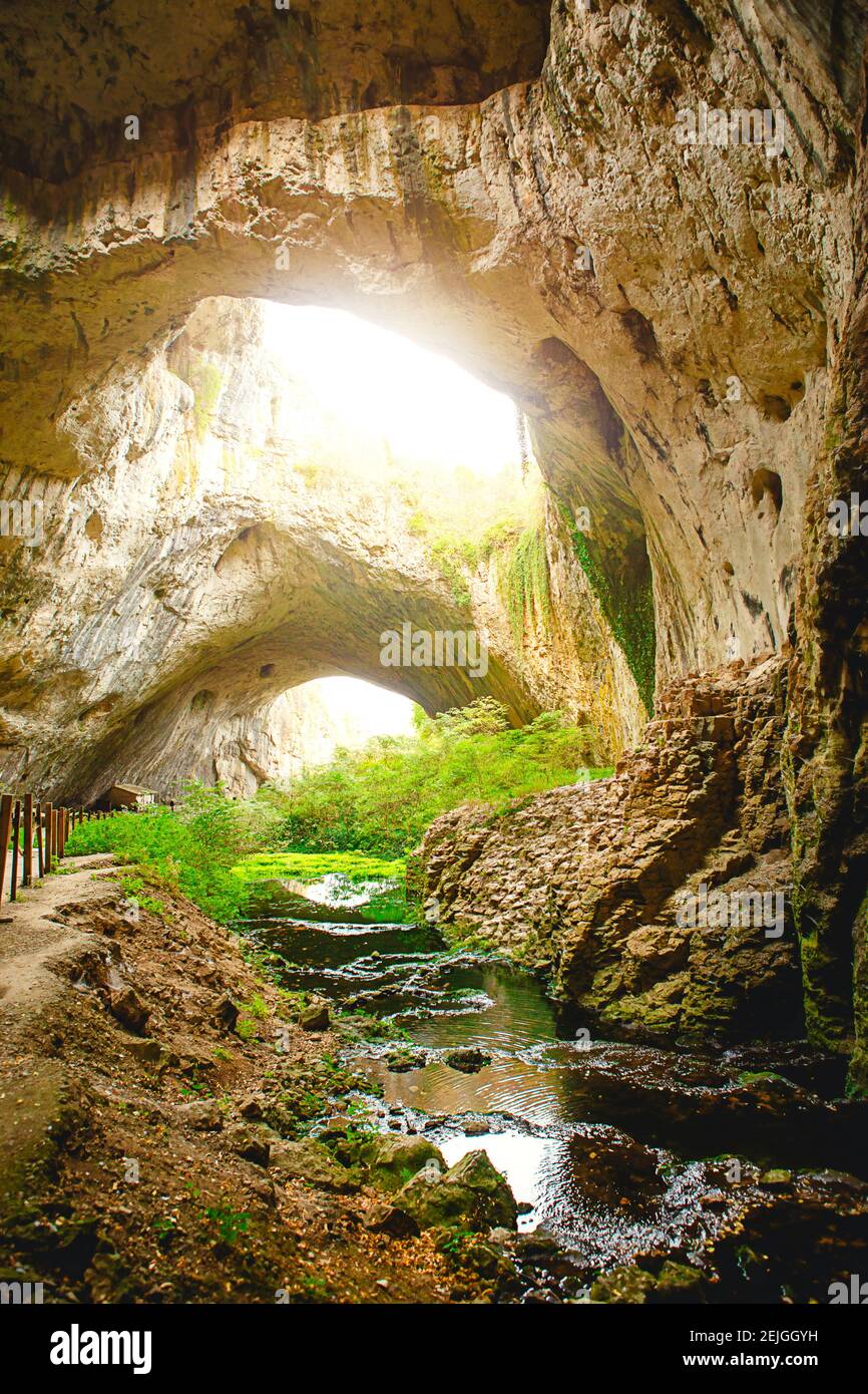Devetashka cave in Bulgaria - natural attraction. High arches of a huge ...