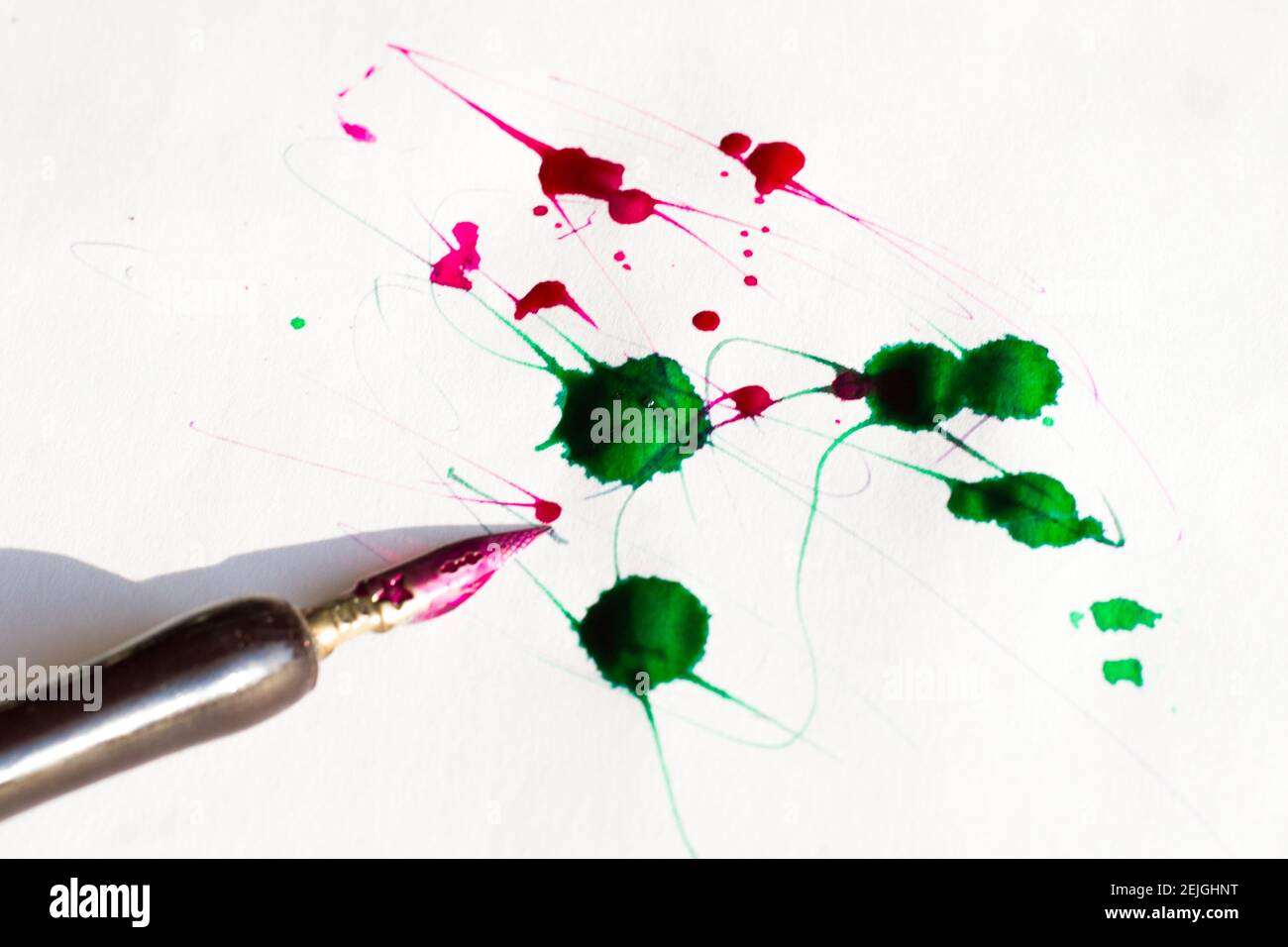 Ink drops on the paper, red, green and blue ink splashes background ...