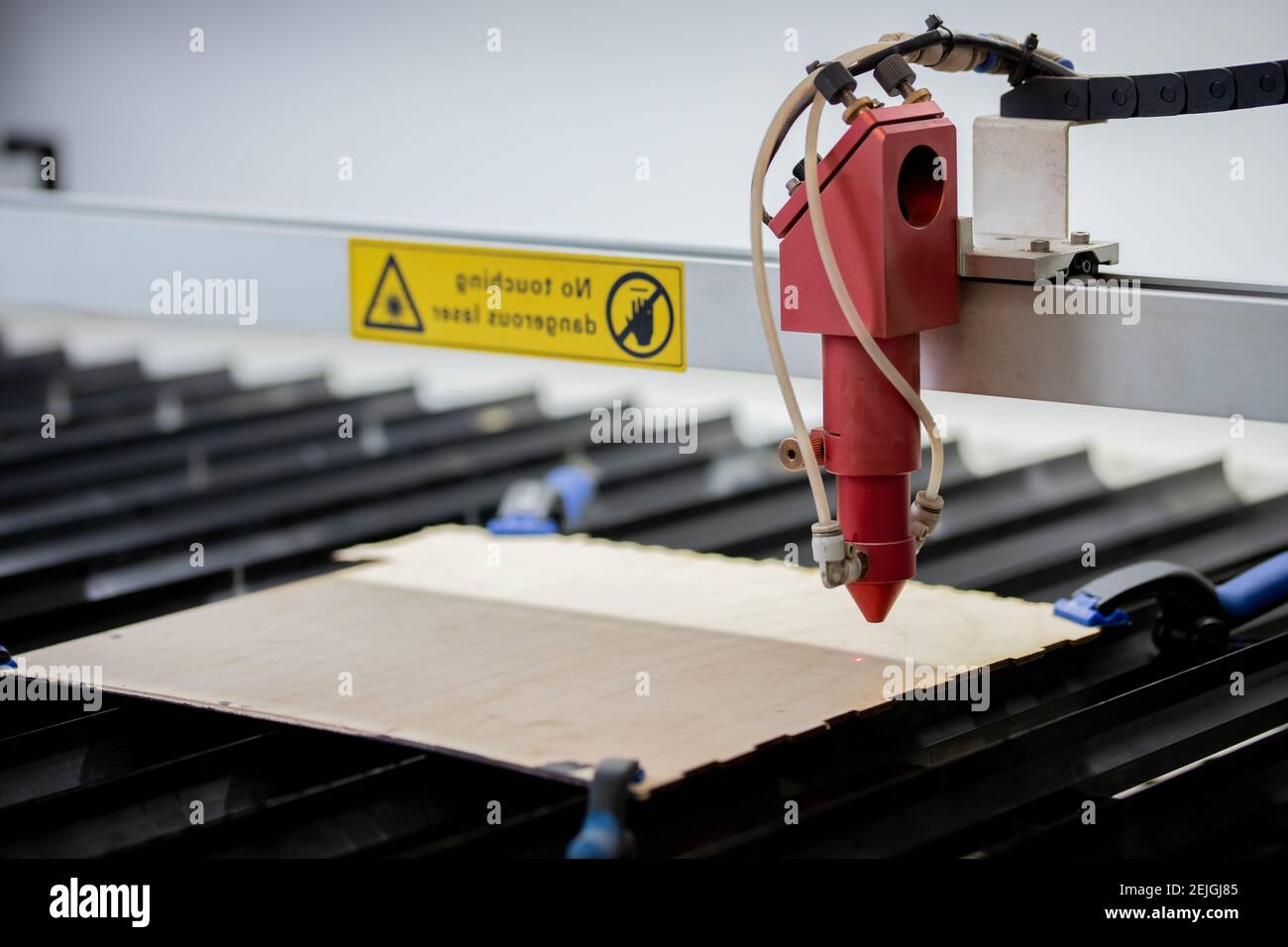 Laser CNC cutting wood. Modern machine industrial technology Stock ...