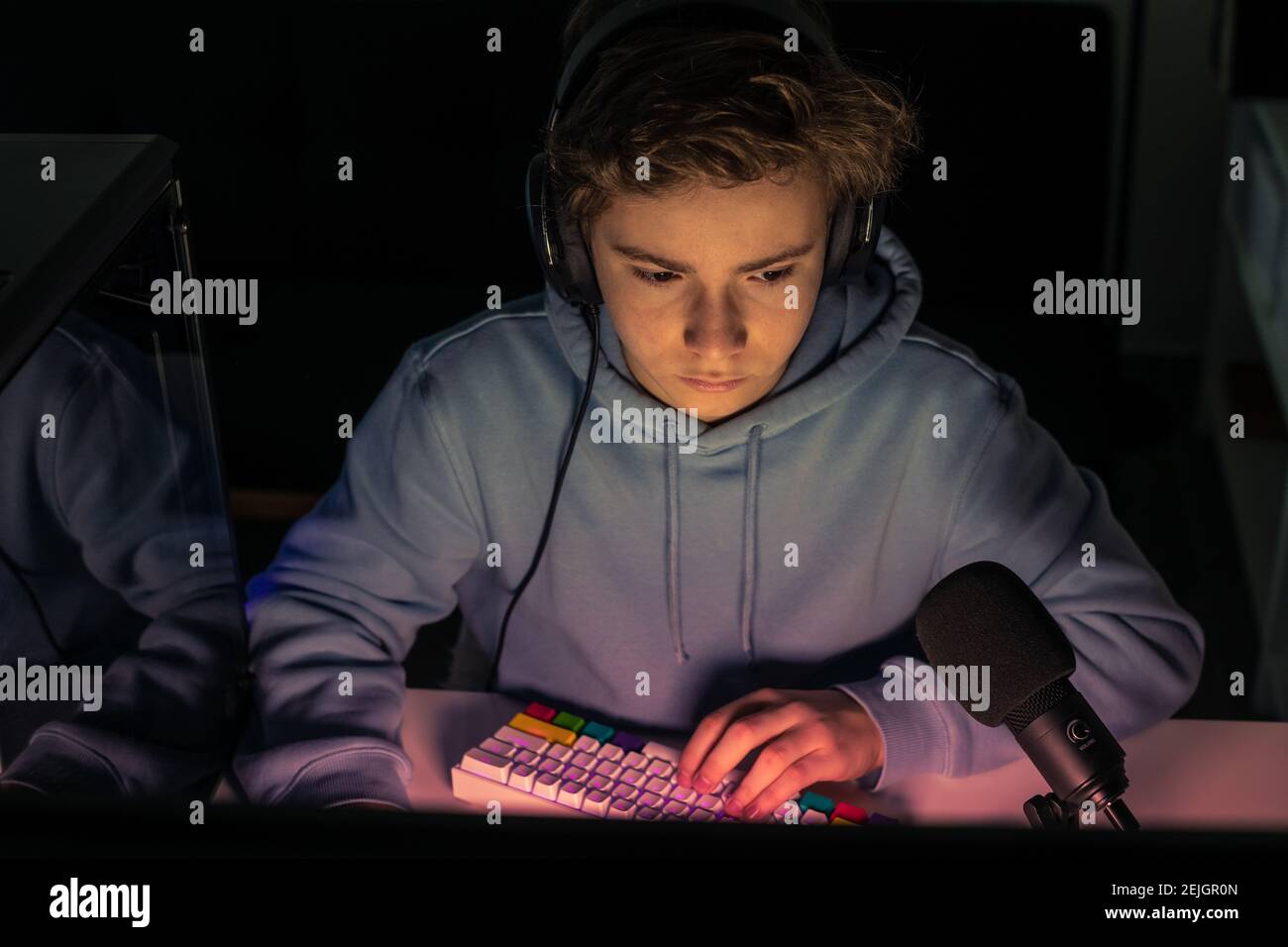 Teen Playing Computer Game High Resolution Stock Photography and Images ...