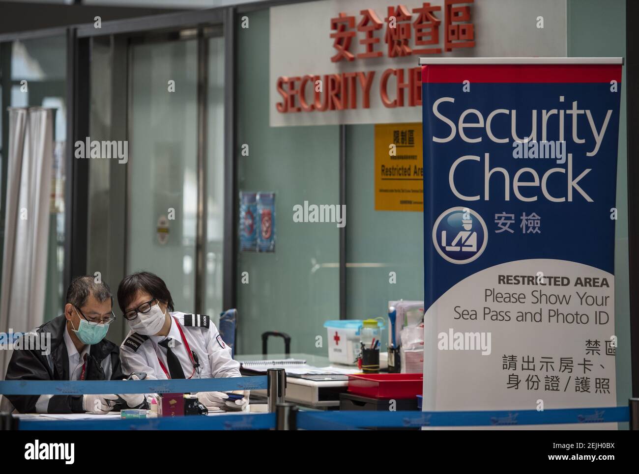 Security guards stand at the Kai Tak Cruise Terminal where Dream World ...