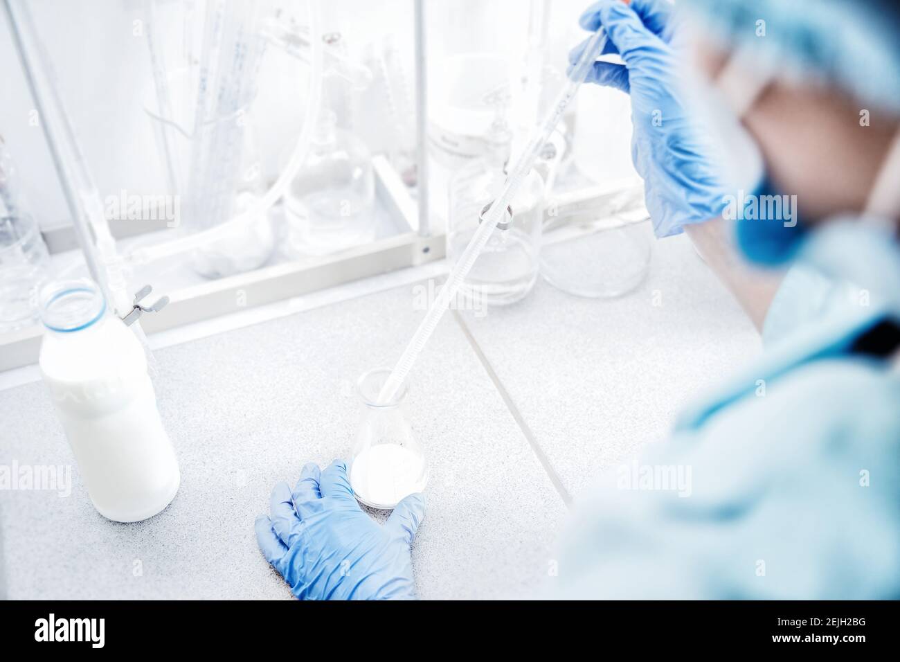 Quality control test of milk in laboratory. Dairy factory industry ...
