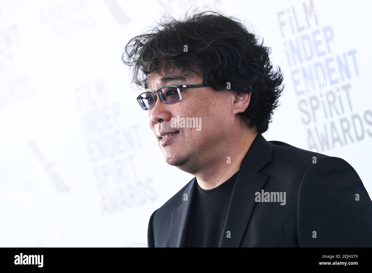 Bong Joon-ho walking on the red carpet at the 35th Annual Film ...